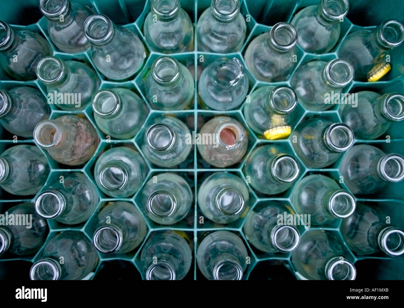Empty glass bottles waiting to be recycled Stock Photo - Alamy