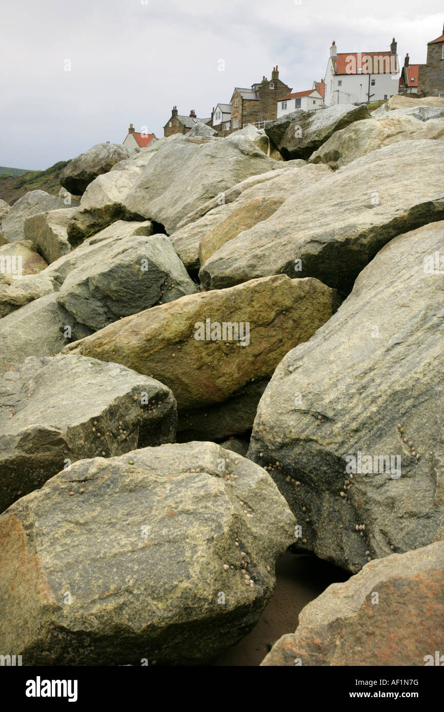 Rock sea defences at Robin Hood's Bay, North Yorkshire Stock Photo - Alamy