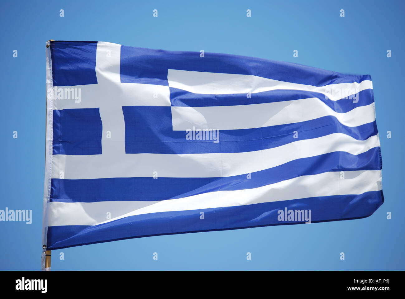 Greek flag flying against blue sky, Corfu, Ionian Islands, Greece Stock ...