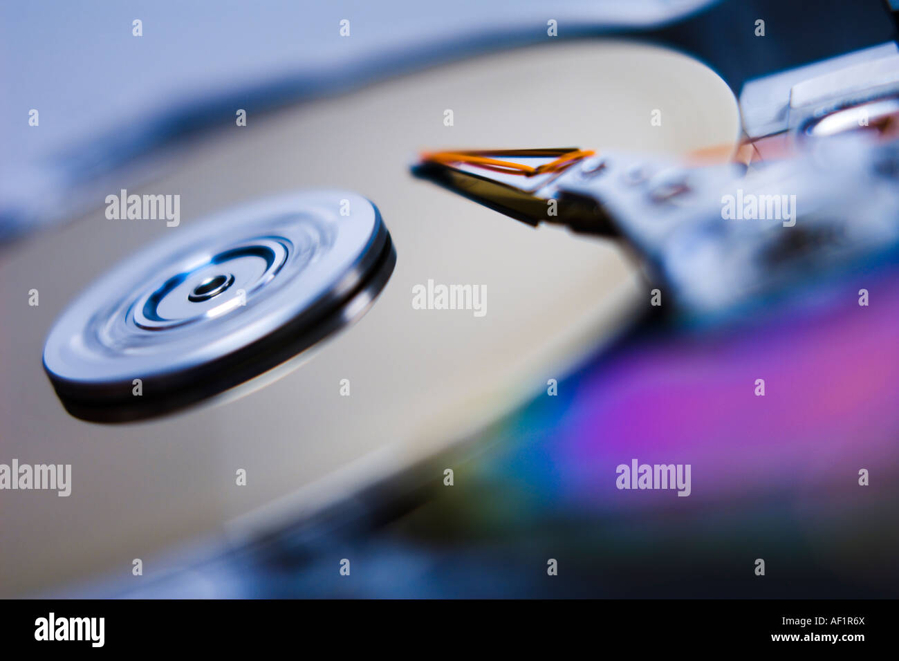 Spinning computer hard drive disc and arm Stock Photo - Alamy