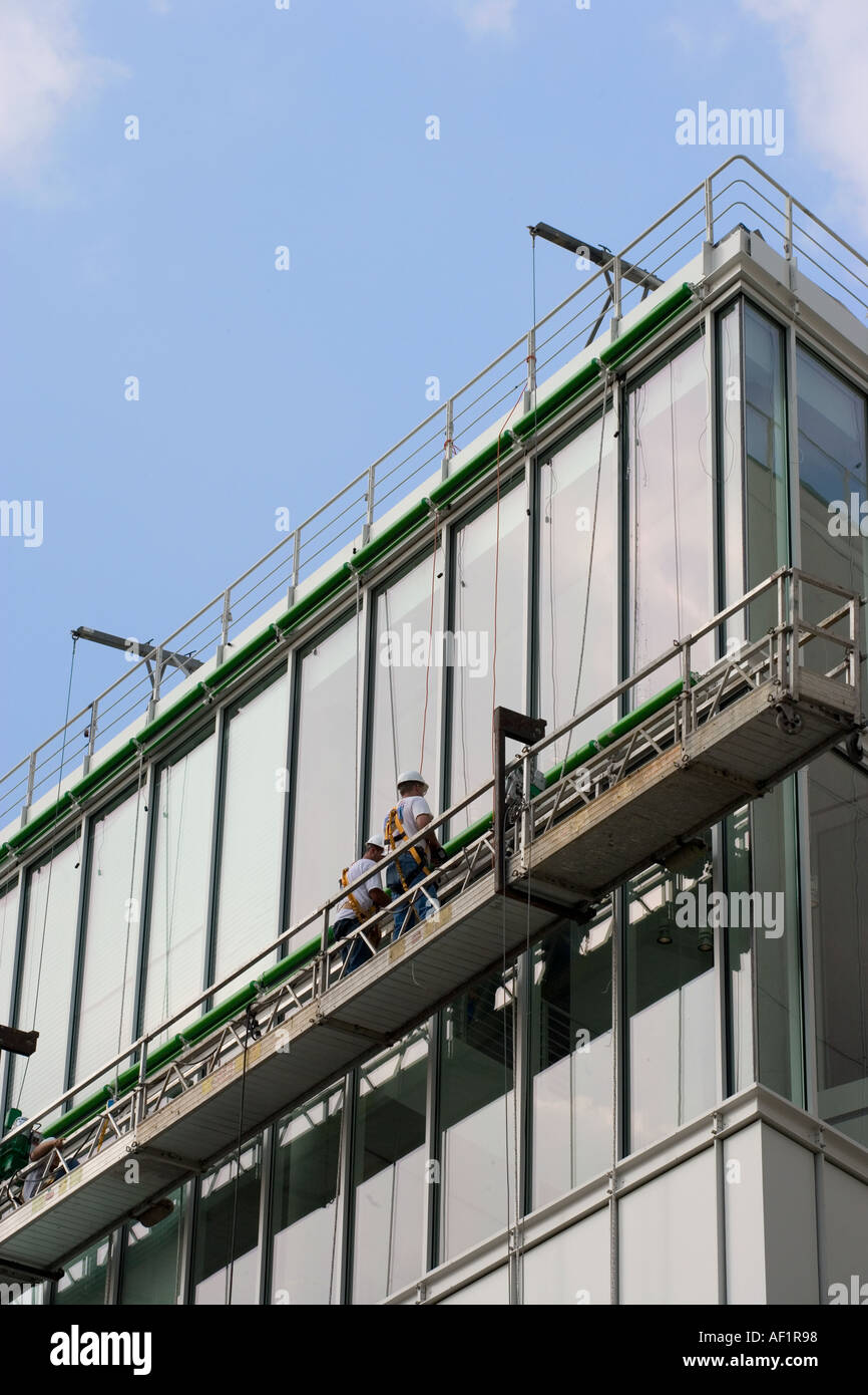 Window construction workers Stock Photo - Alamy