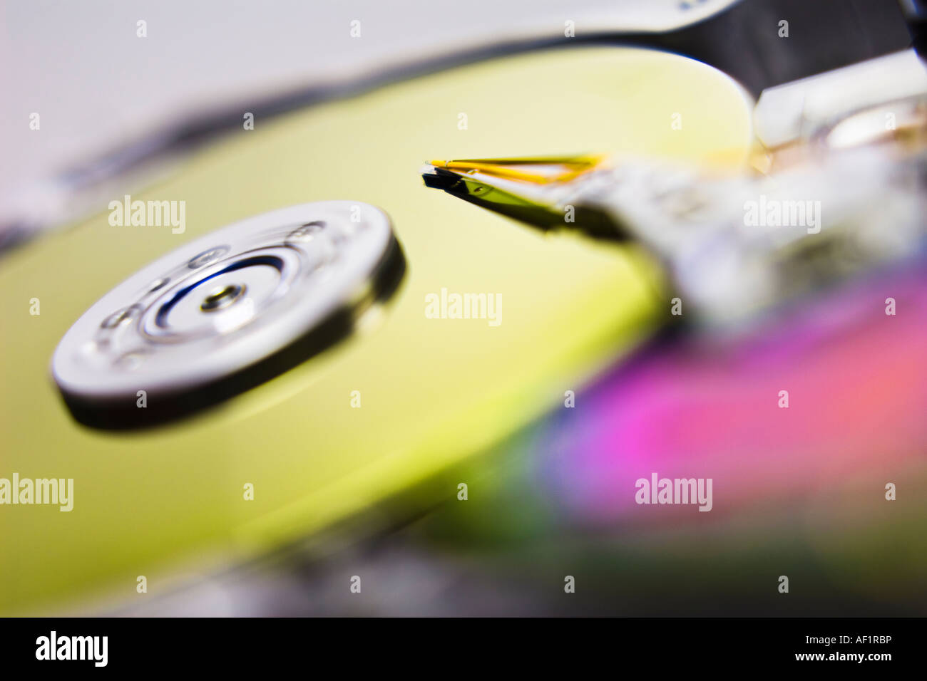 Spinning computer hard drive disc and arm Stock Photo - Alamy