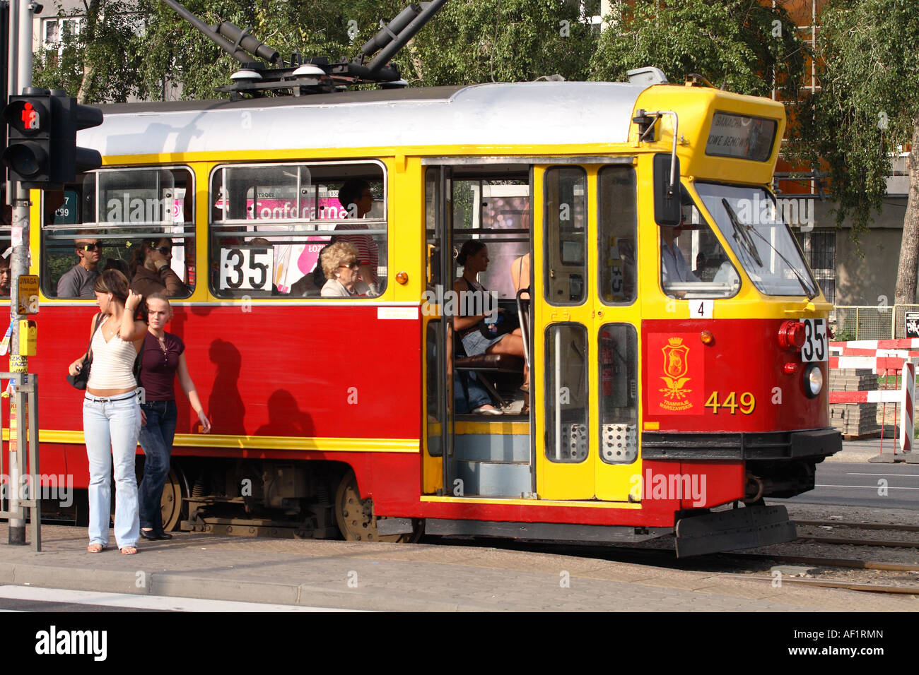 Warsaw Poland public transport tram network in the traditional red and ...