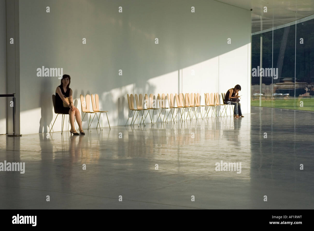 Two women waiting in the foyer of the 21st Century Museum of ...