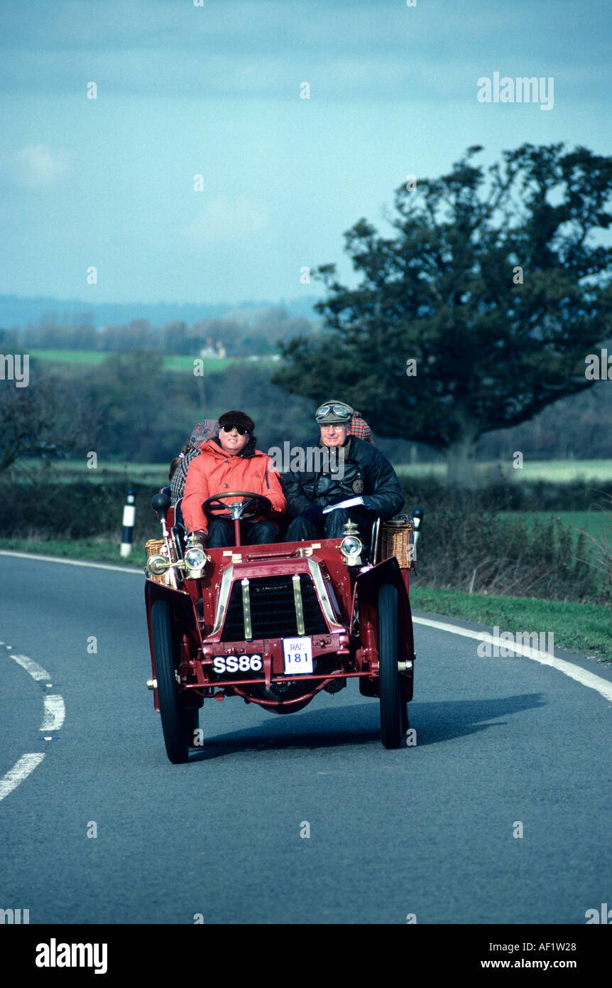 Vintage Car on a country road Stock Photo - Alamy