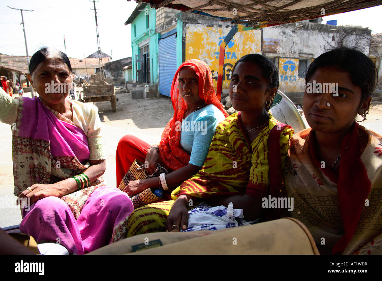 Indian women in the rear of chakda, Diu, Gujarat, India Stock Photo - Alamy