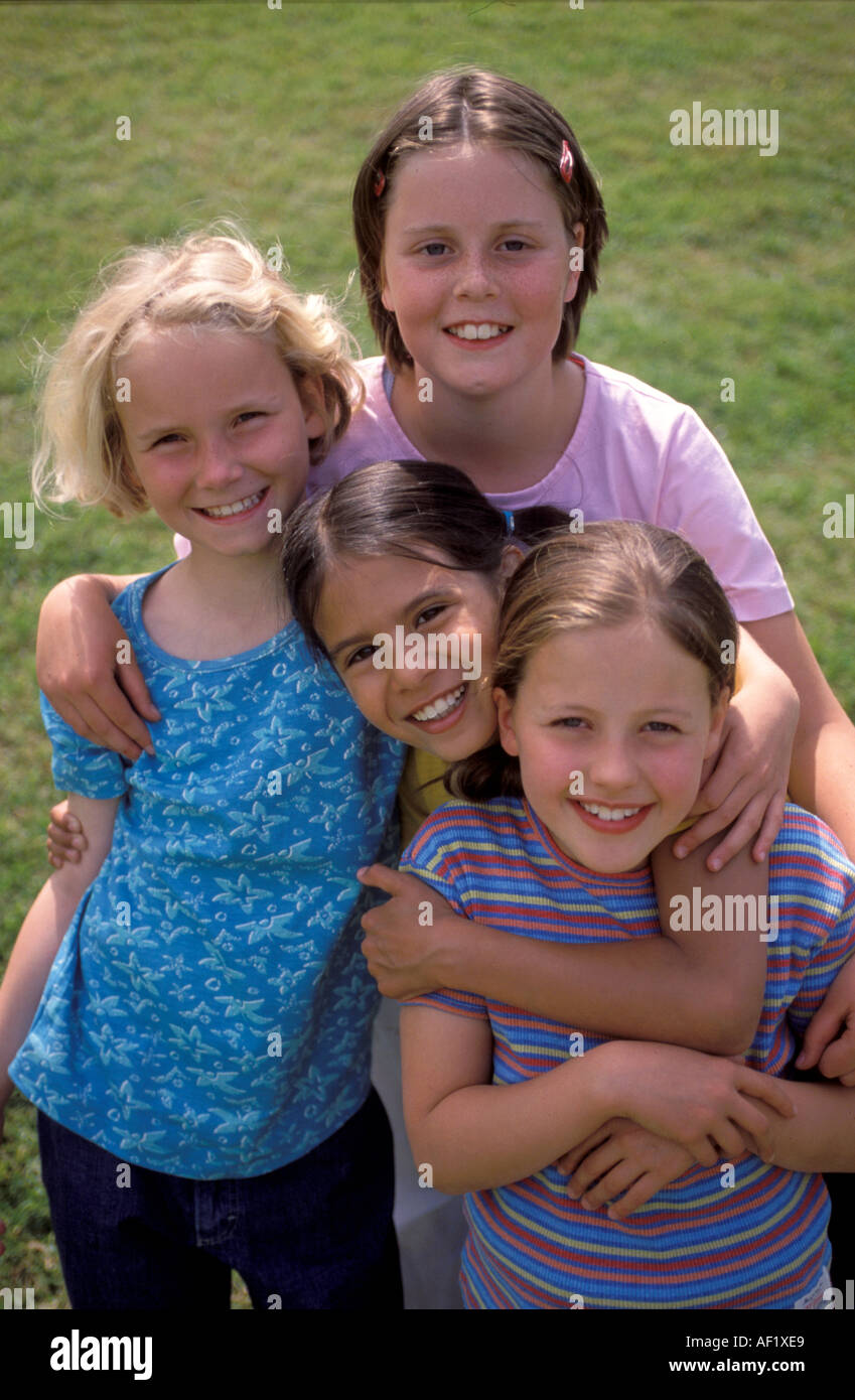 Four girl friends together Stock Photo - Alamy