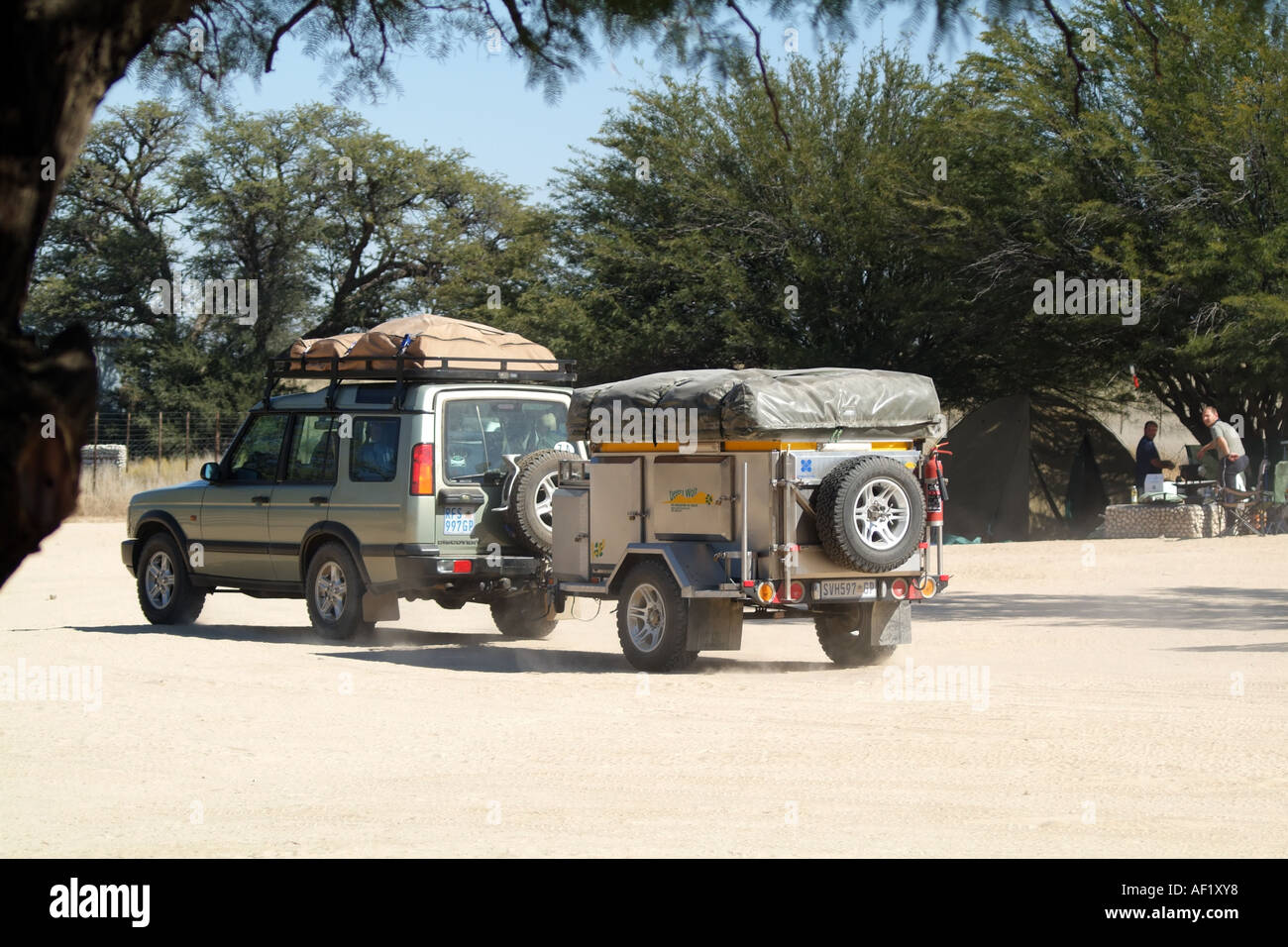 4X4 car pulling a trailer in the Kalahari South Africa RSA Stock Photo ...