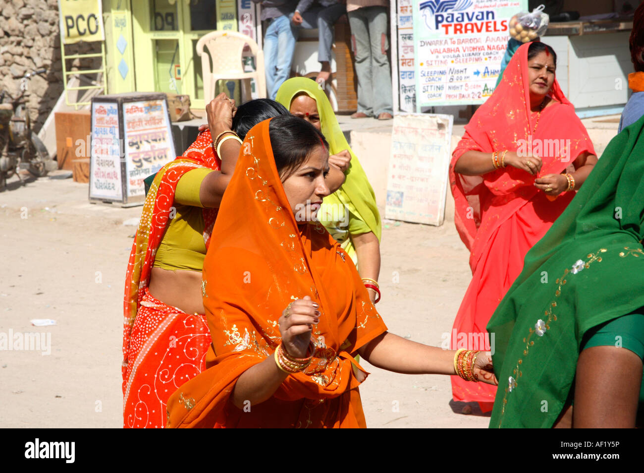 Indian women dancing celebrating holi spring festival of colours ...
