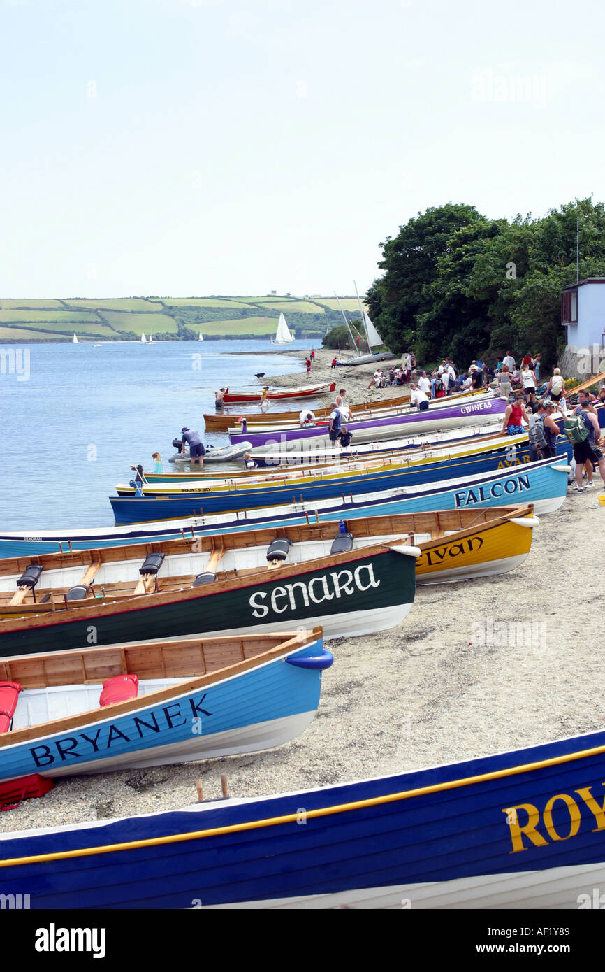 Pilot gigs lined up on the beach at Mylor on The River Fal Cornwall UK ...