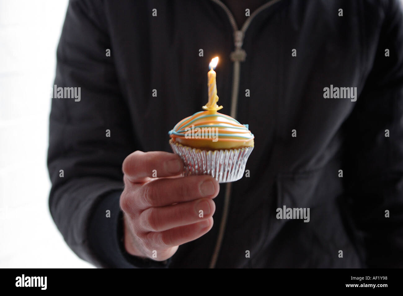 Holding birthday hi-res stock photography and images - Alamy