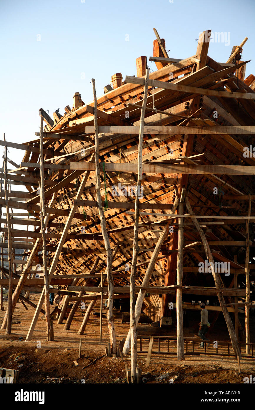 Wooden boat being built at shipbuilding yard, Mandvi, Kutch, Gujarat ...