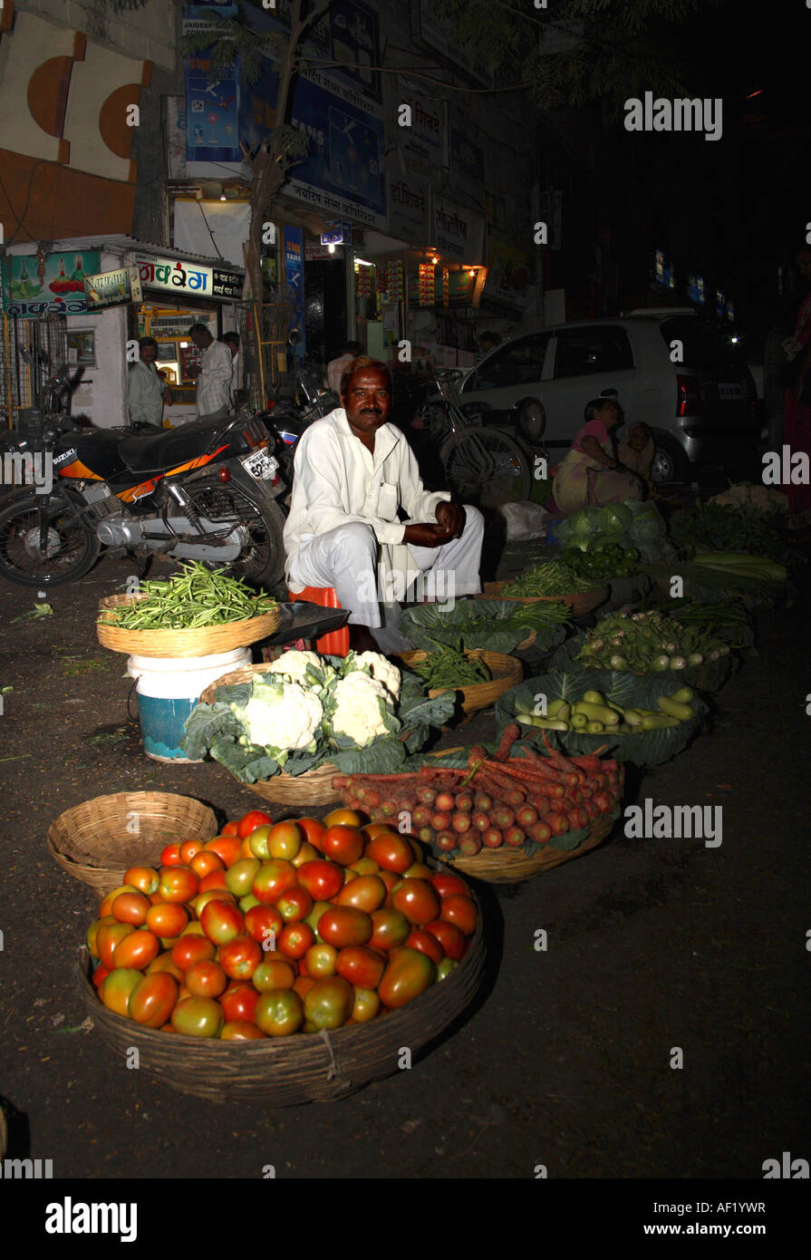 Indian Night Market Trader selling vegetables after dusk, Nasik ...