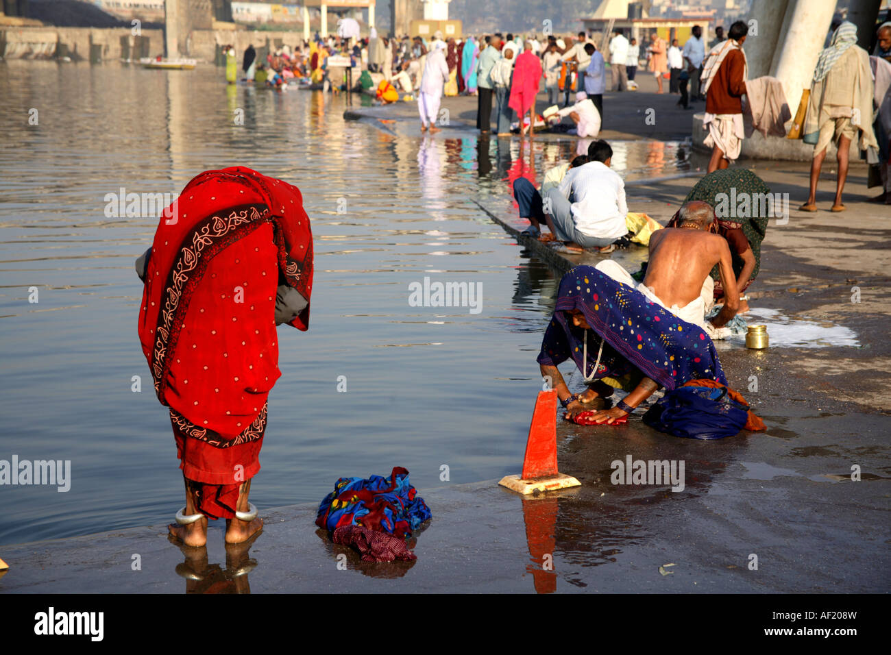 Indian women washing clothes by hand hi-res stock photography and images - Alamy