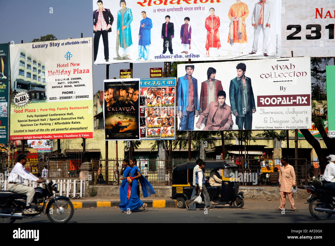 Advertisement billboards for Indian male fashions and new hotel offer ...