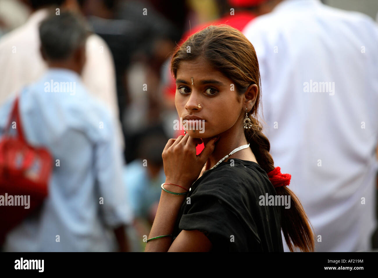 Pretty young Indian Female waiting at railway station, Pune, India ...
