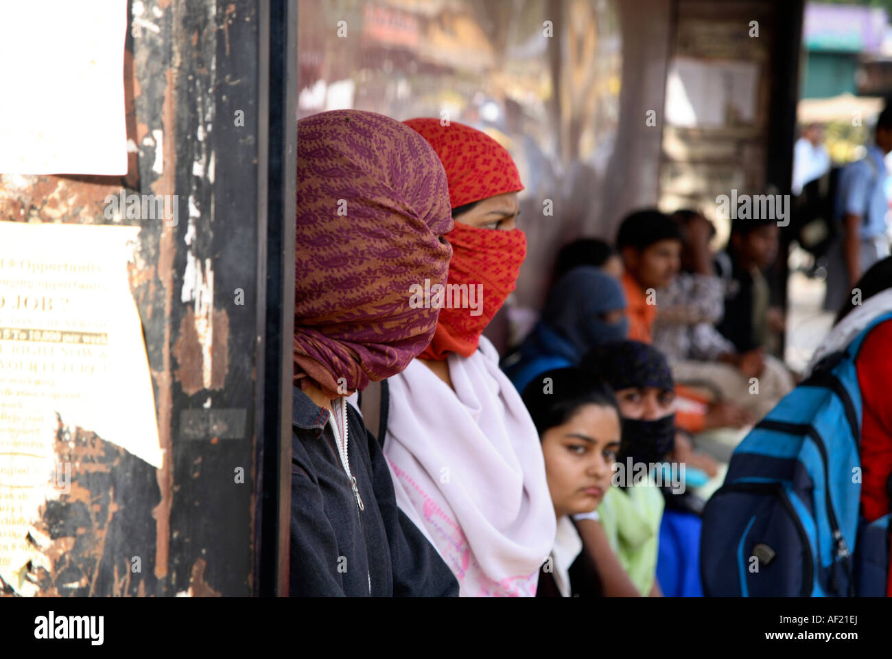 Indian Females waiting at bus-stop in Pune, India Stock Photo - Alamy