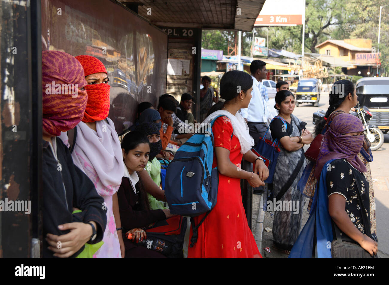 Indian Females waiting at bus-stop in Pune, India Stock Photo - Alamy