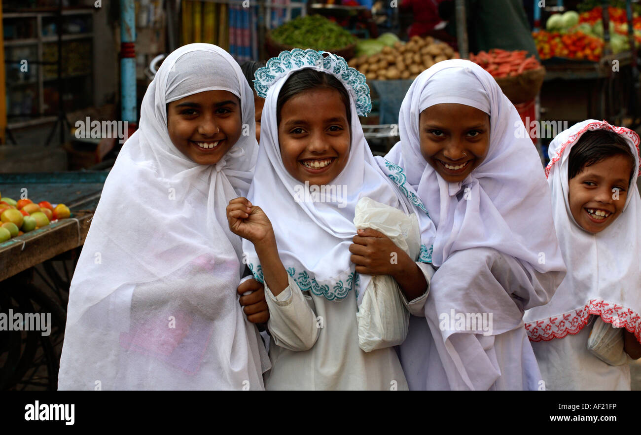 Four young Indian Muslim girls smiling happily for camera, Pune, India ...