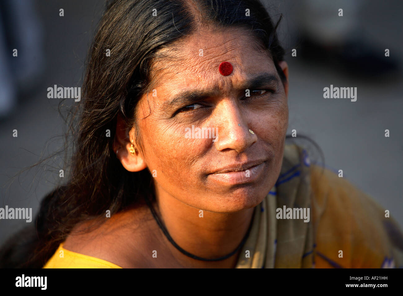 Close up portrait of Indian female waiting at Railway Station, Pune ...