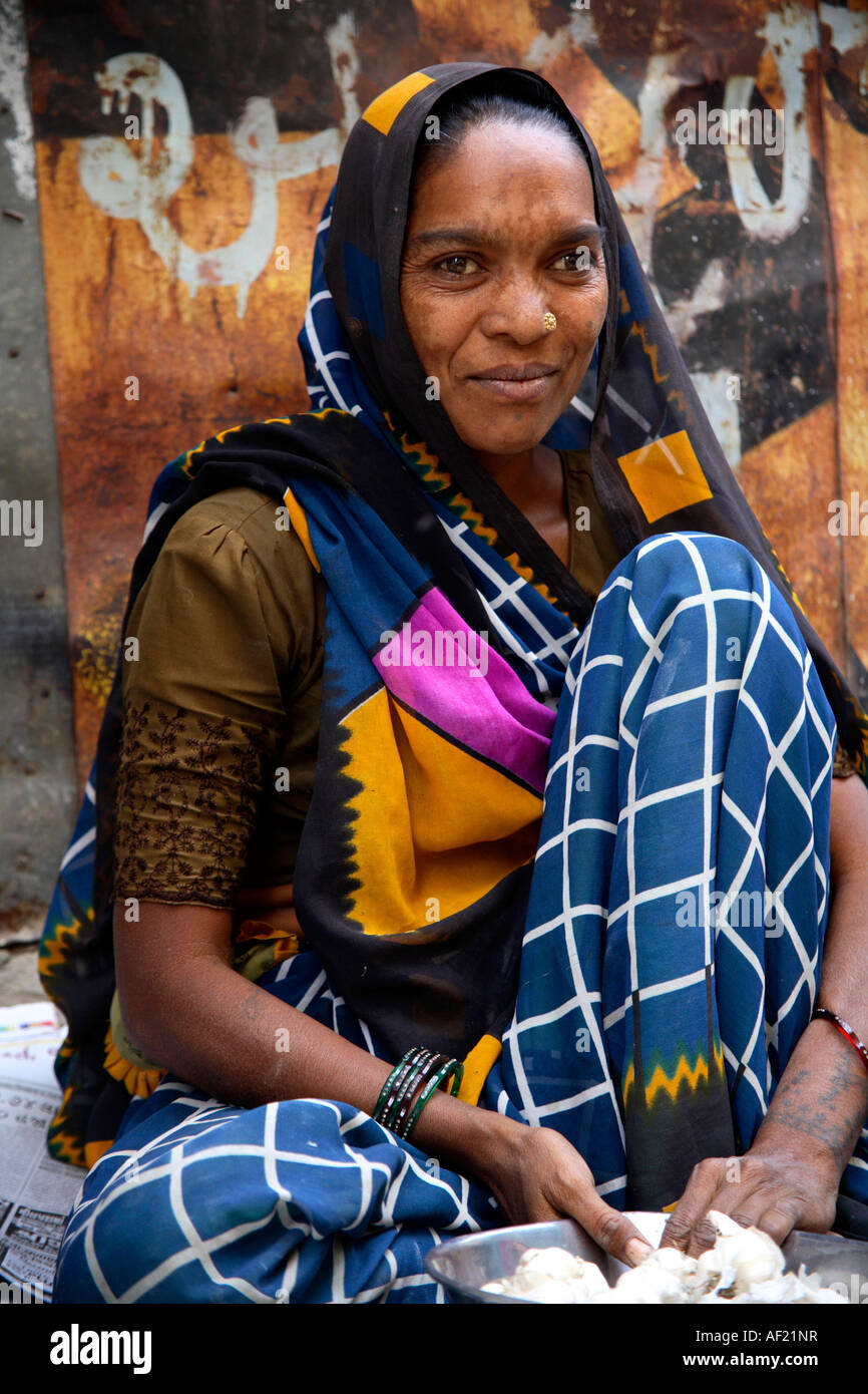 Female Indian trader at market stall, Una, Gujarat, India Stock Photo ...