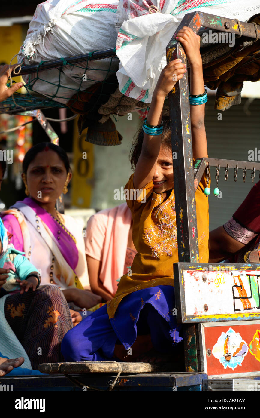 Shy young Indian Child in the rear of chakda - motorbike taxi, Una ...