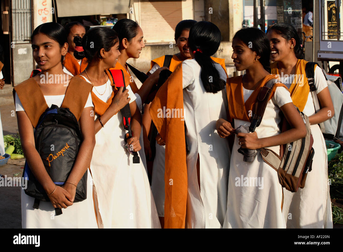 Group of pretty young Indian schoolgirls waiting at bus-stand, Una ...