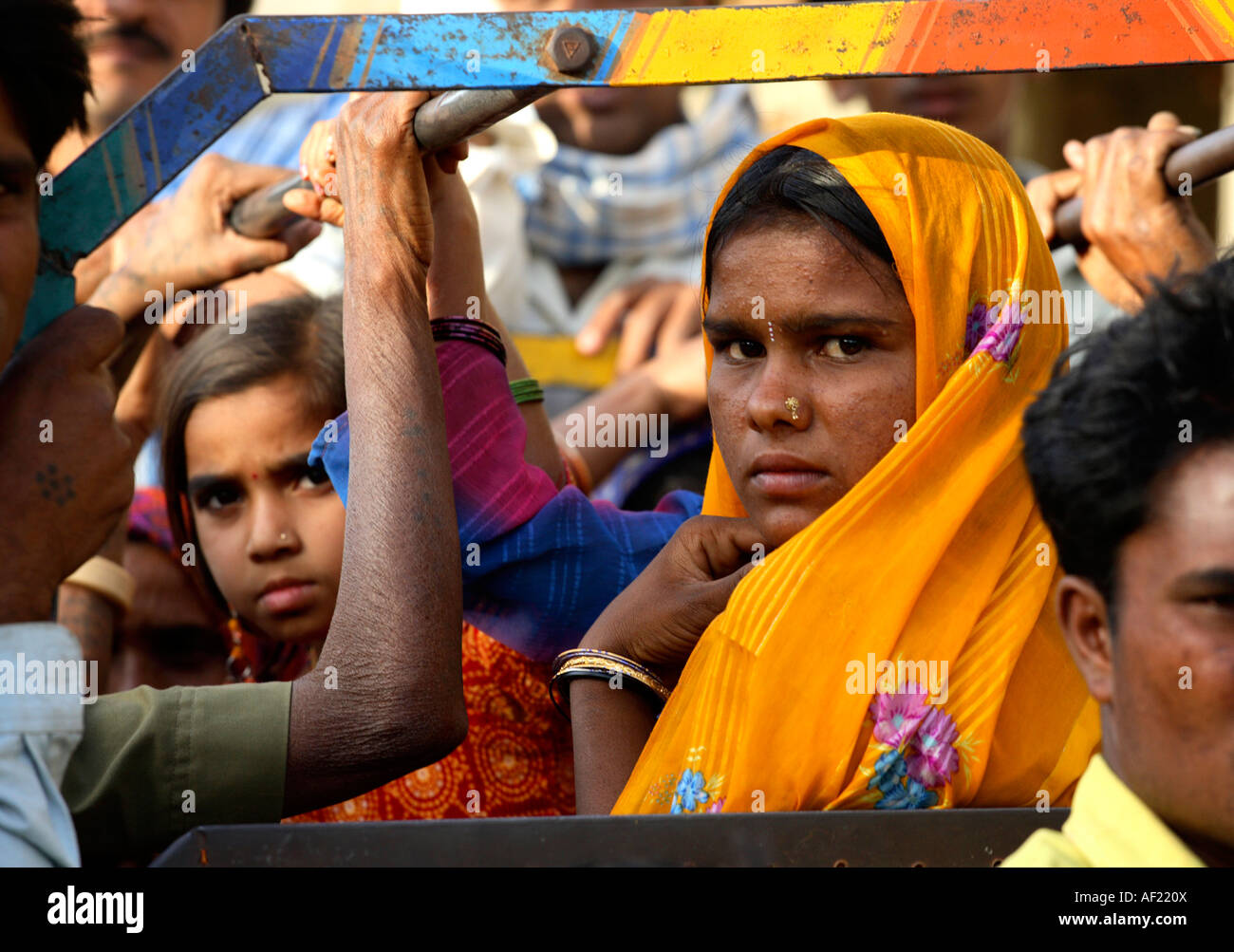 Attractive young Indian female in back of chakda, Una, Gujarat, India ...