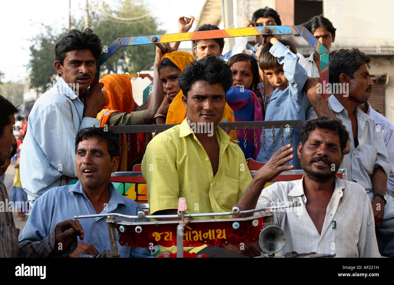 Indian passengers on full chakda - motorbike rickshaw taxi leaving Una ...