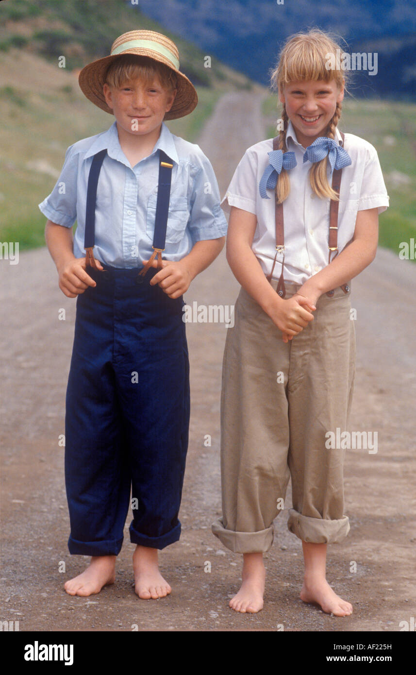 Barefoot children walk a Montana country road Stock Photo - Alamy