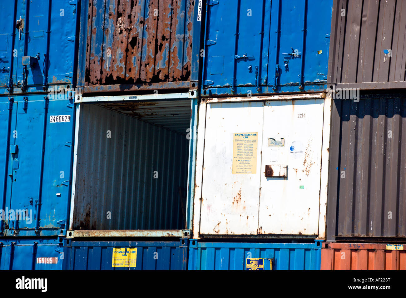 Colourful old shipping container storage Stock Photo - Alamy