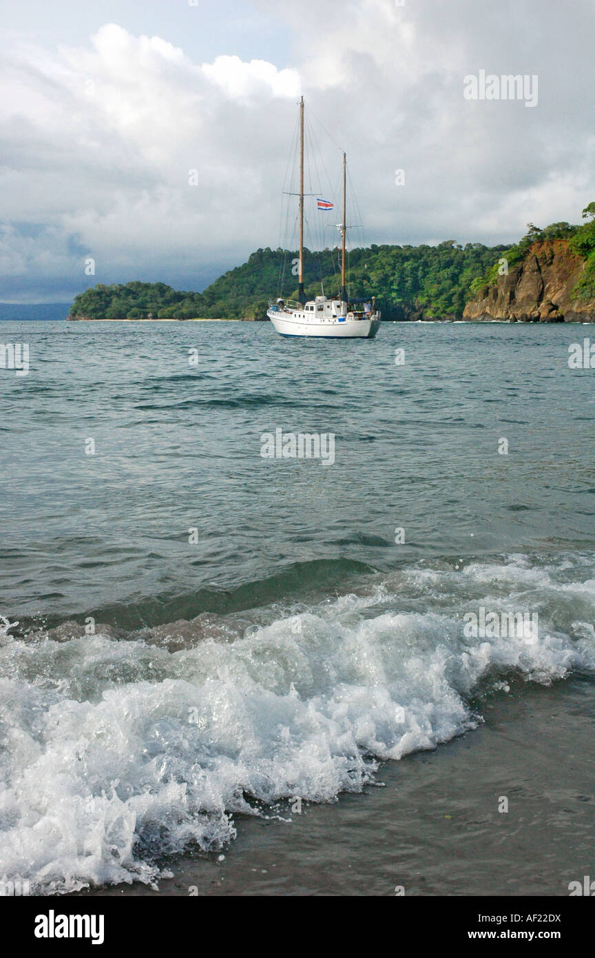 Sailboat & Tropical Island Stock Photo - Alamy