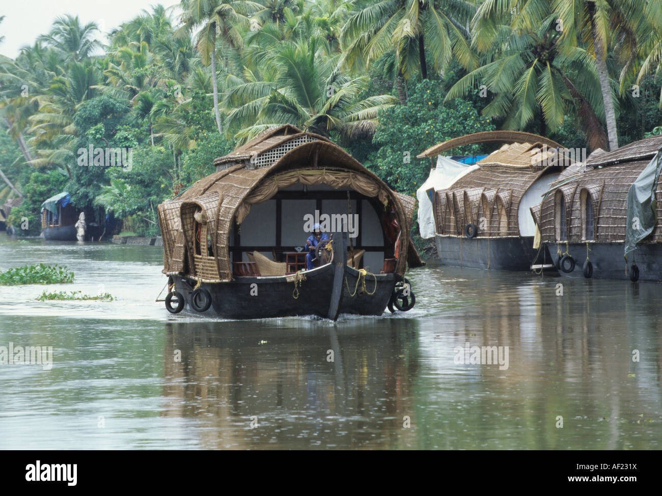 rice boat kerala backwaters Stock Photo - Alamy