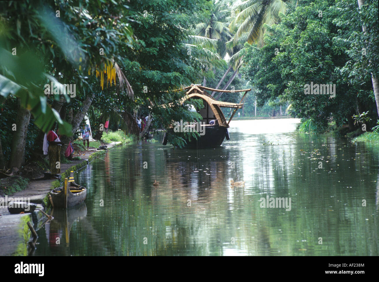 rice boat backwaters kerala Stock Photo - Alamy