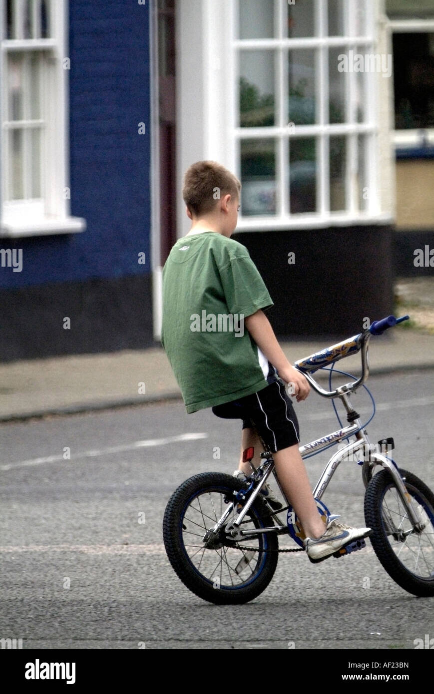 boy riding bicycle Stock Photo - Alamy