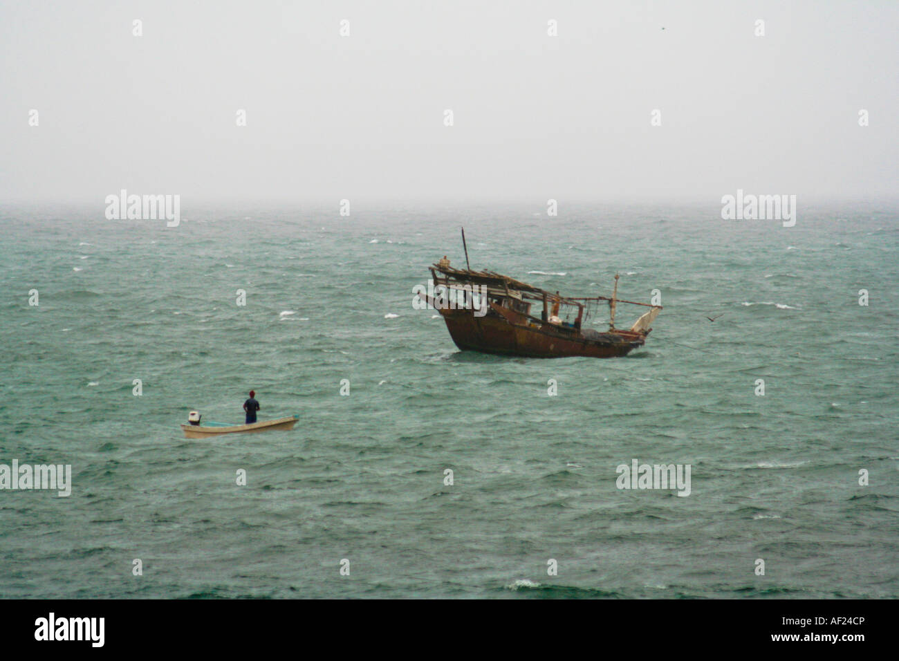 Small Motorboat and Dhow During Kharif or Summer Monsoon Salalah ...