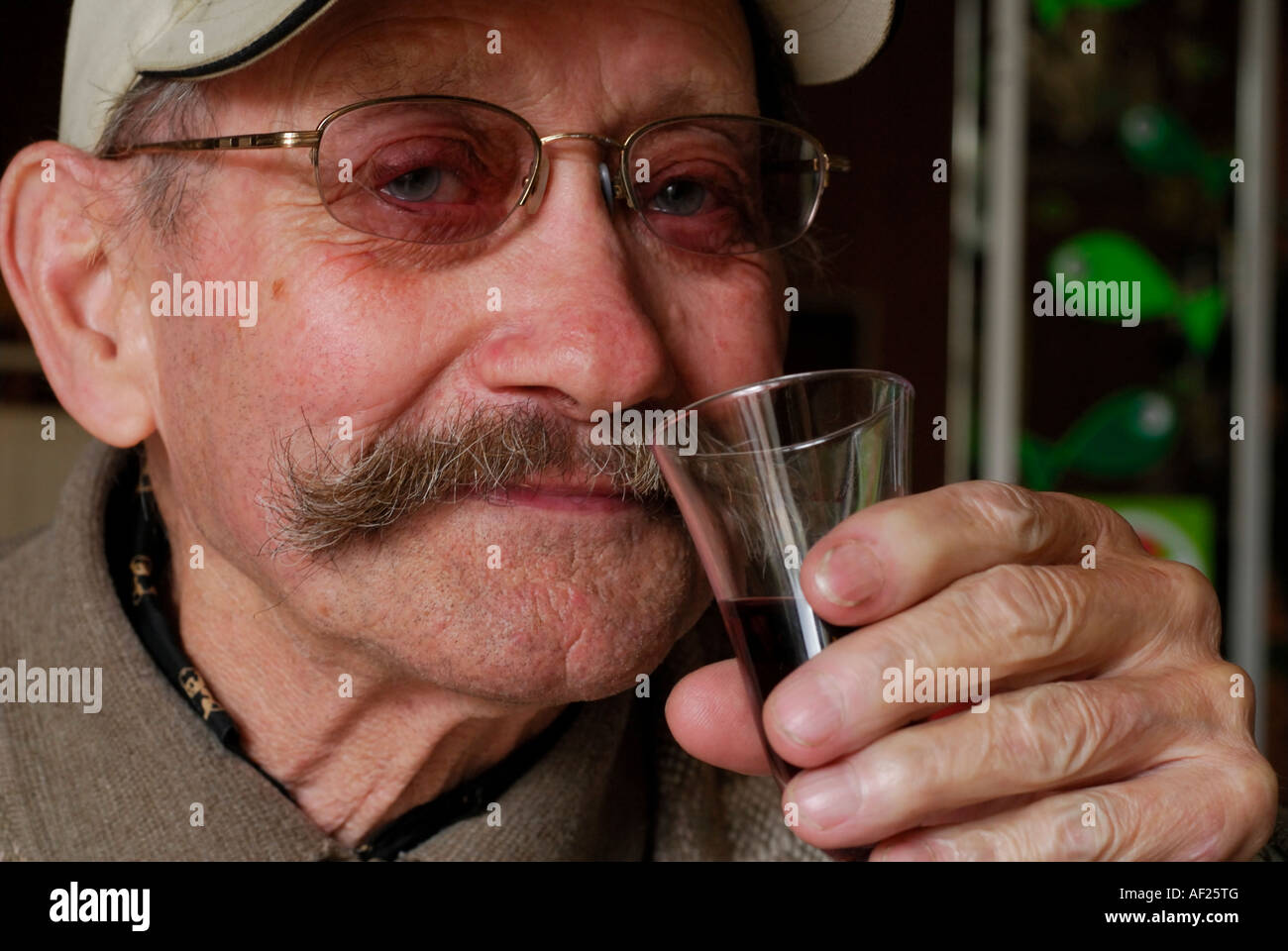 Frenchman drinking red wine Stock Photo - Alamy