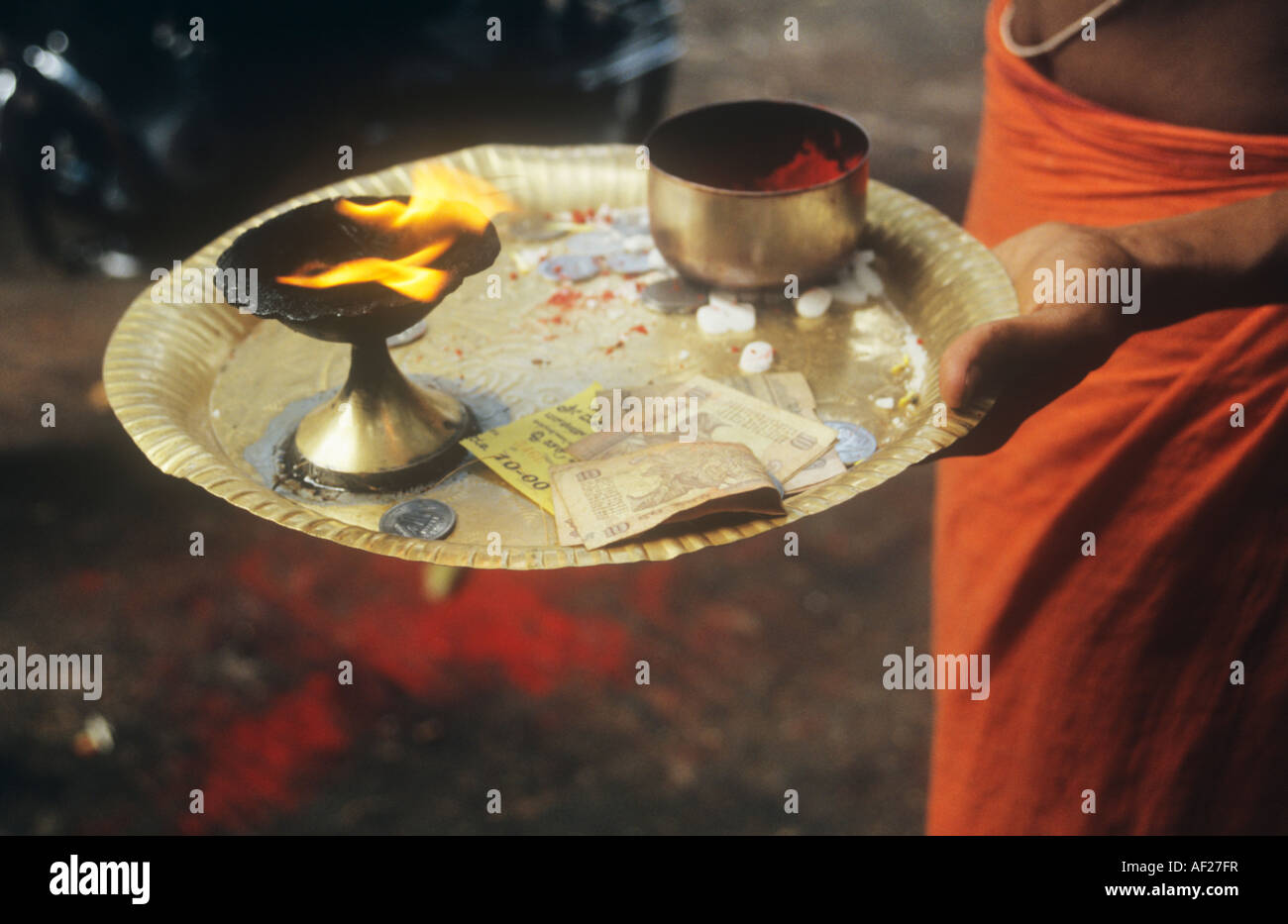 Blessing tray of Hindu monk Stock Photo - Alamy