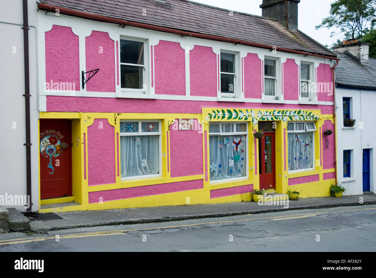 pink and yellow building Stock Photo - Alamy