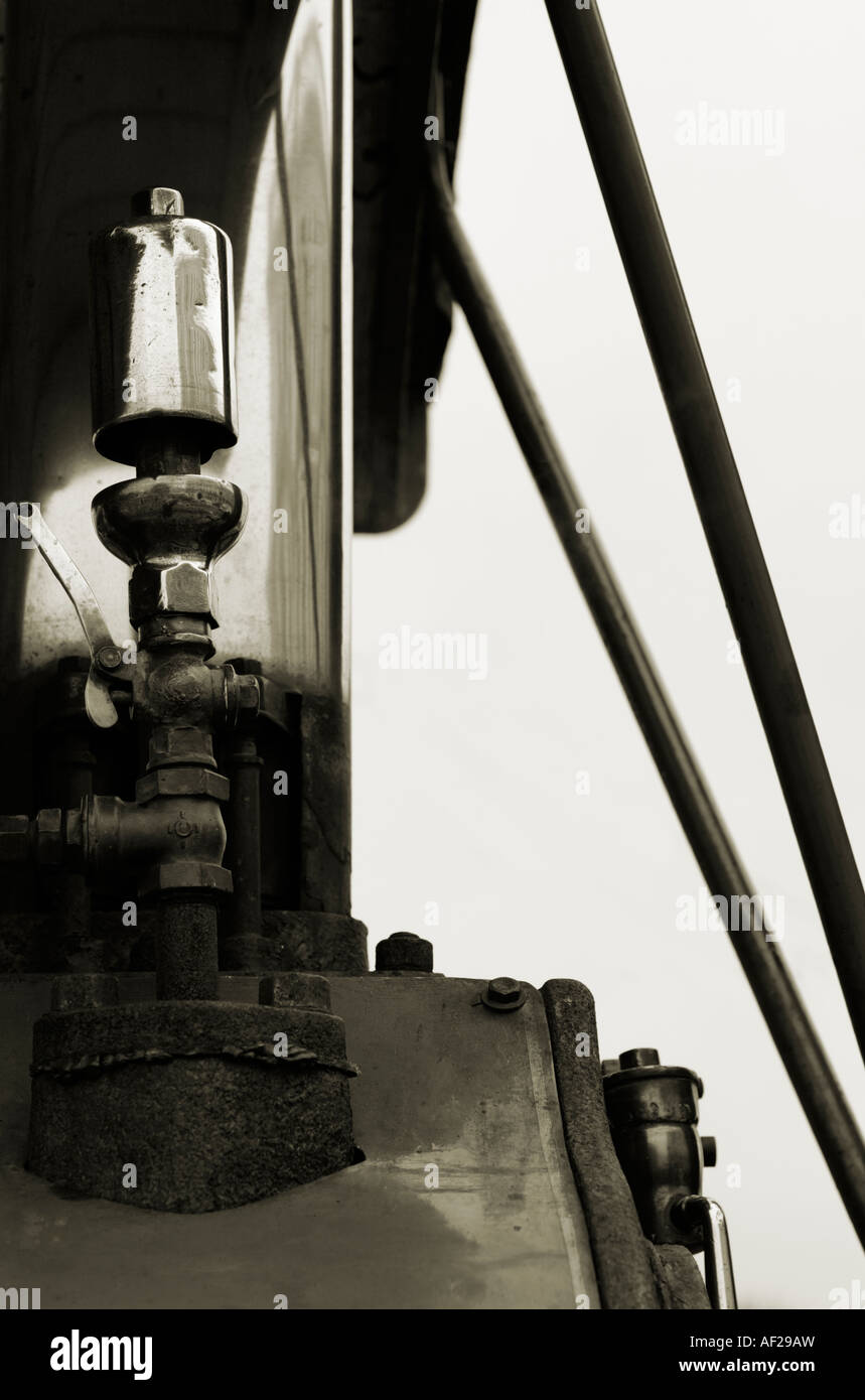 Detail of pressure valve on veteran steam engine Stock Photo - Alamy