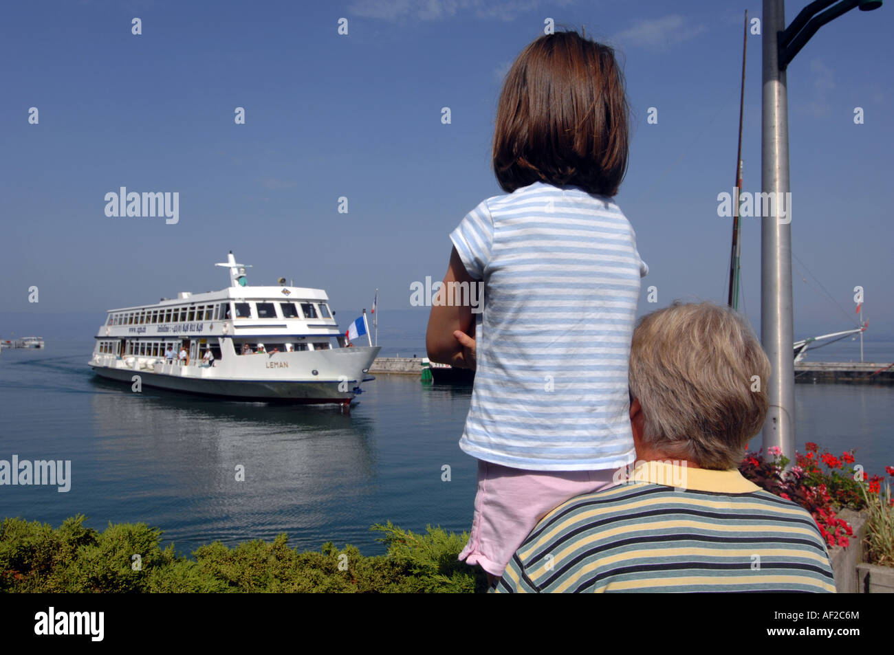 Cruise boat, passenger ferry arriving at Evian on Lake Geneva, Lac ...