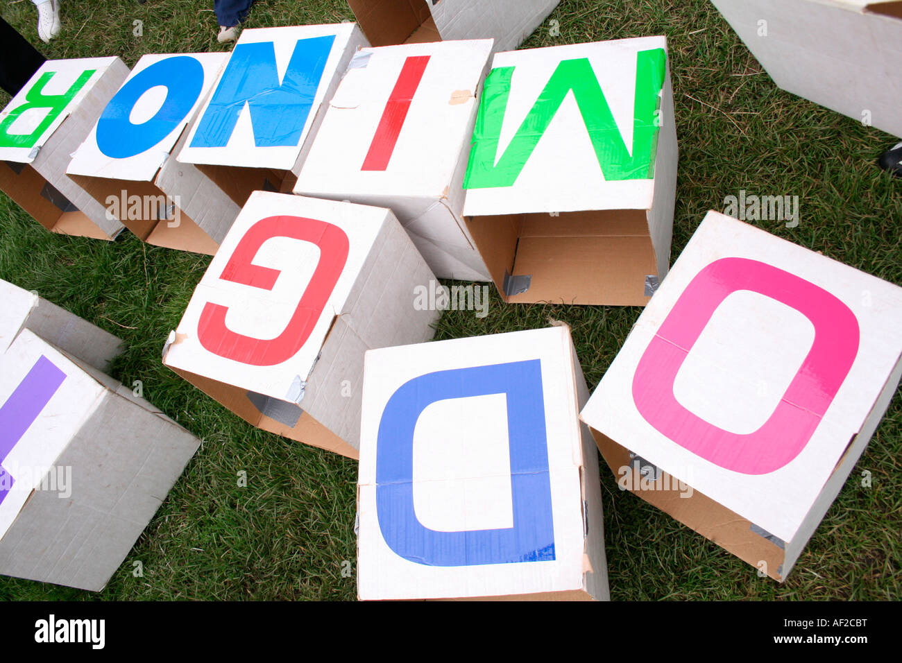 Colored letters printed on boxes for team building games Stock Photo ...