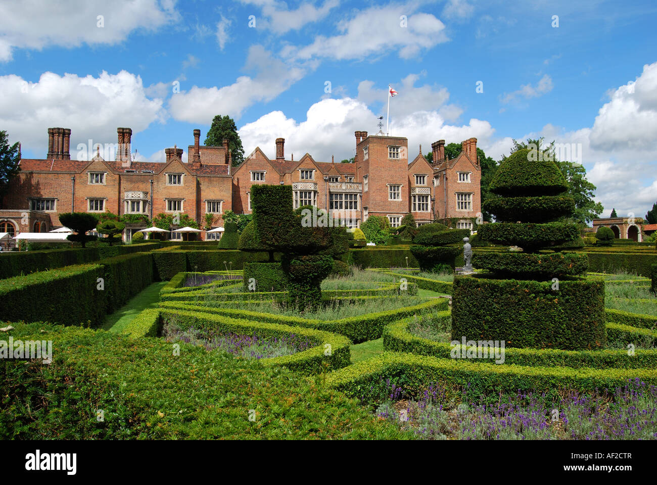 Manicured hedges and topiary gardens of Great Fosters Hotel, Egham ...