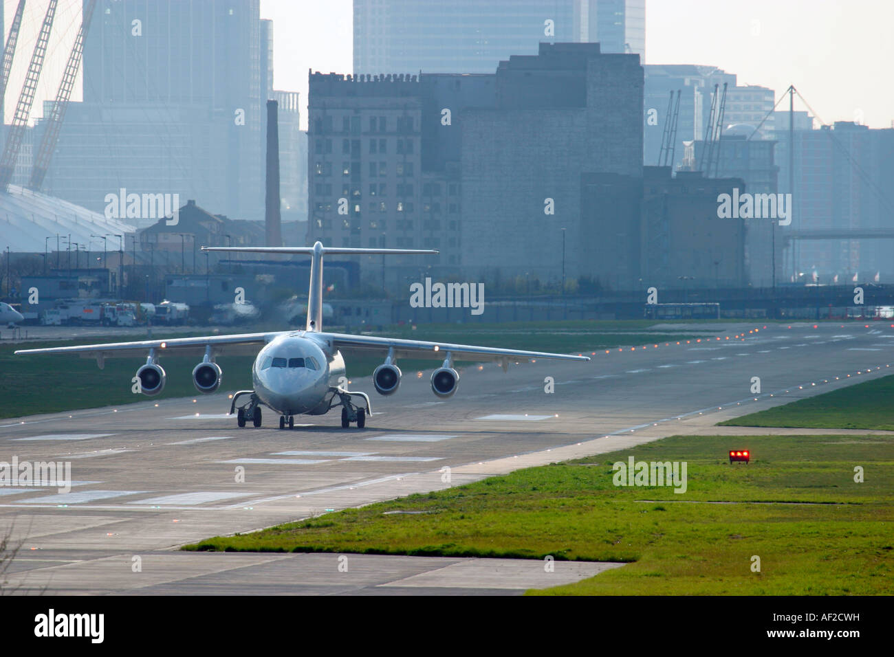 Regional plane jet on runway Stock Photo - Alamy