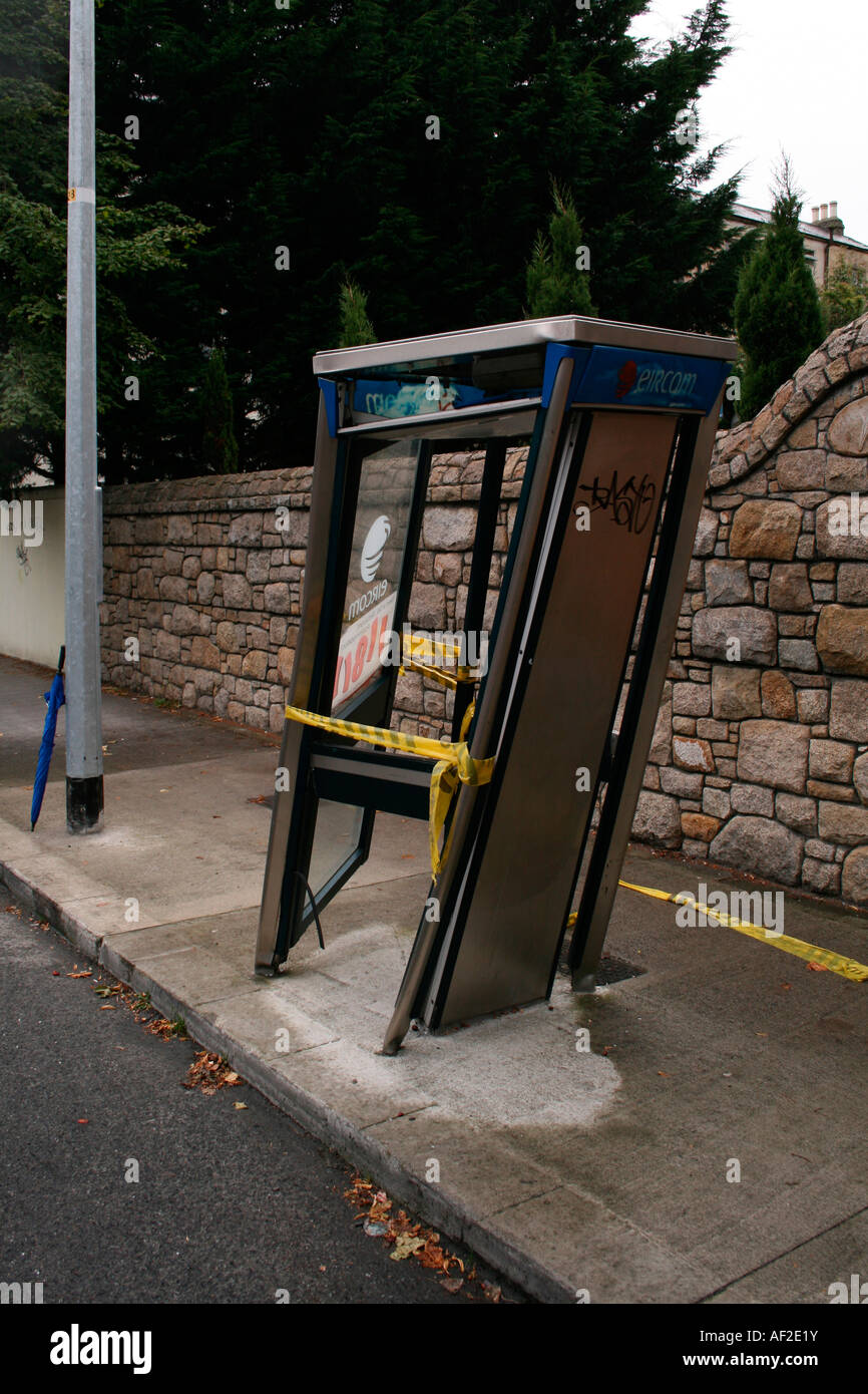 Bent telephone box Stock Photo - Alamy