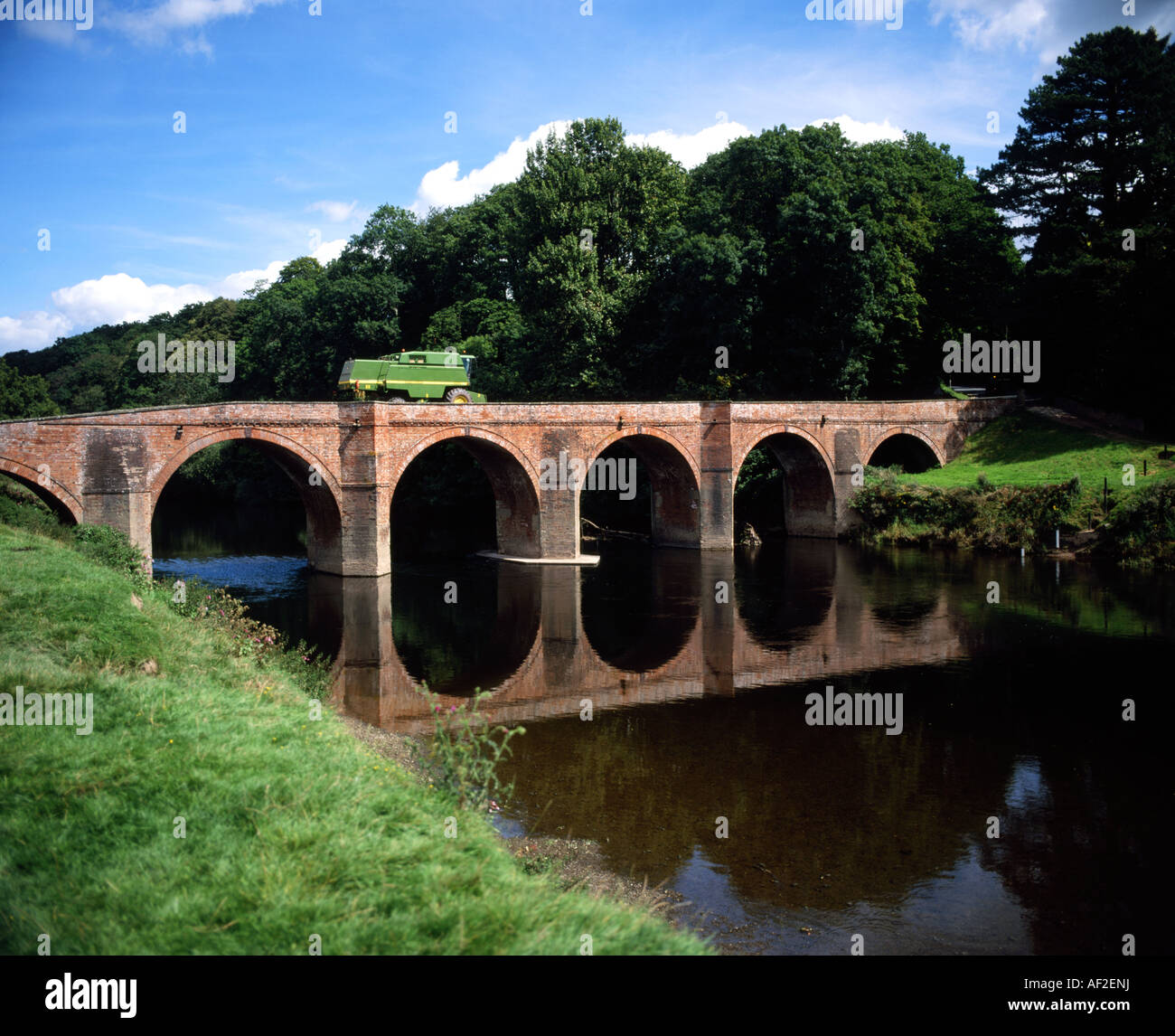combine harvester crosing bridge and river wye bredwardine ...