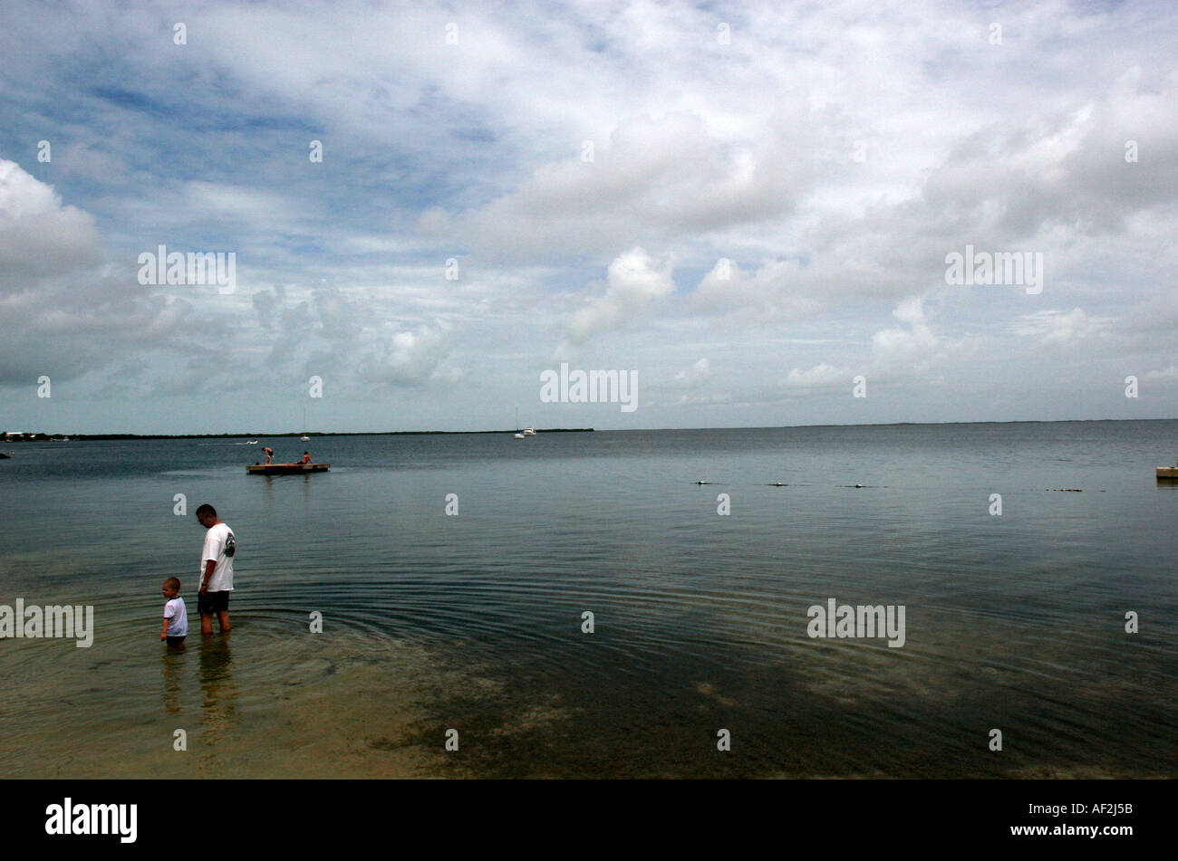 Florida Keys sky and sea dwarf beachgoers Stock Photo - Alamy