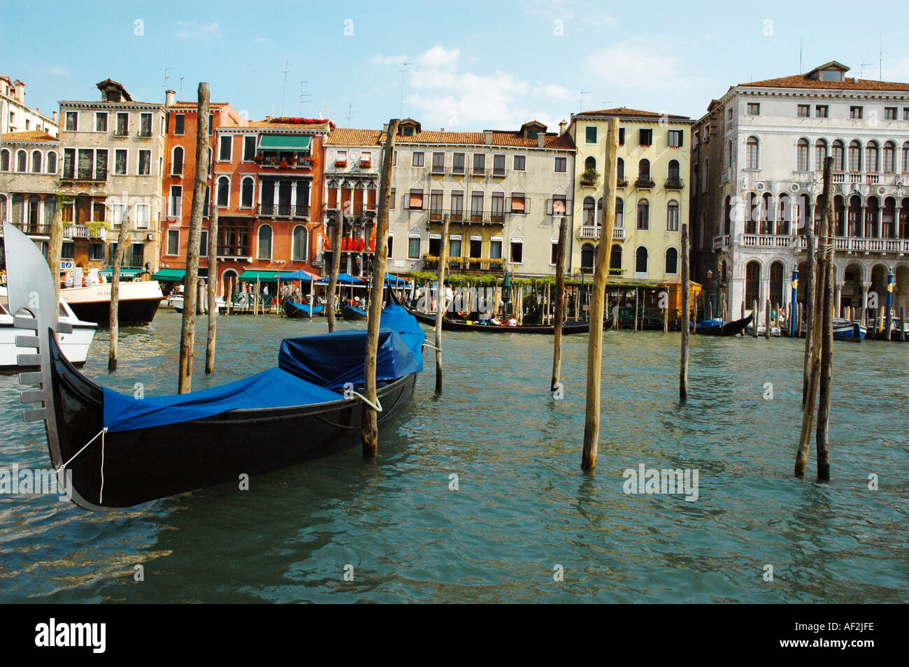 Venice architecture house windows gondola canal Stock Photo - Alamy