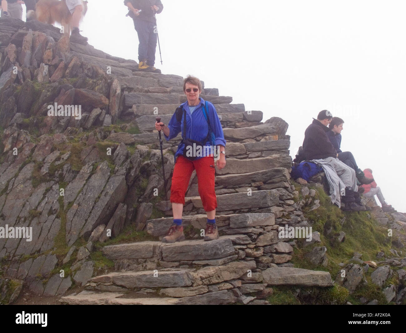 SNOWDON YR WYDDFA GWYNEDD UK August Woman walking down the steps from ...