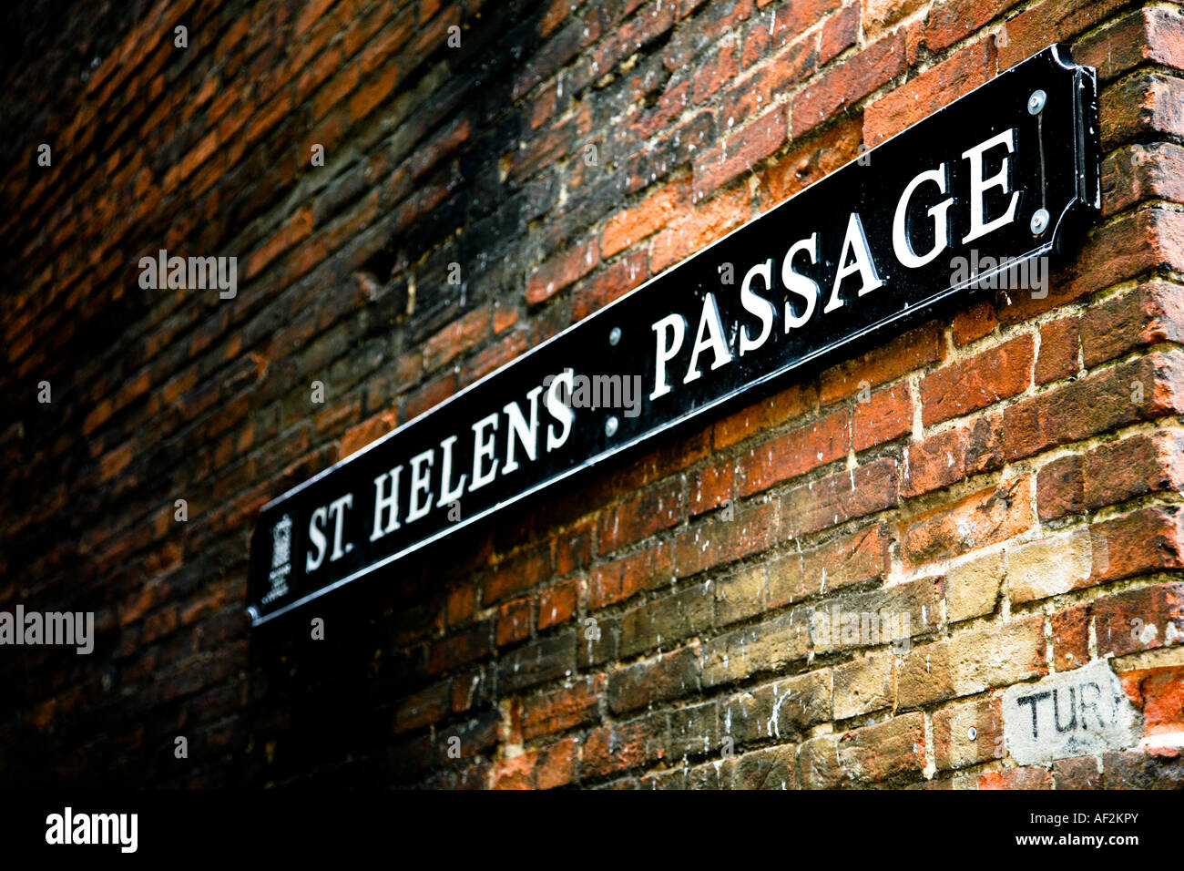 St Helens Passage road sign, situated on an old brick wall, Oxford ...